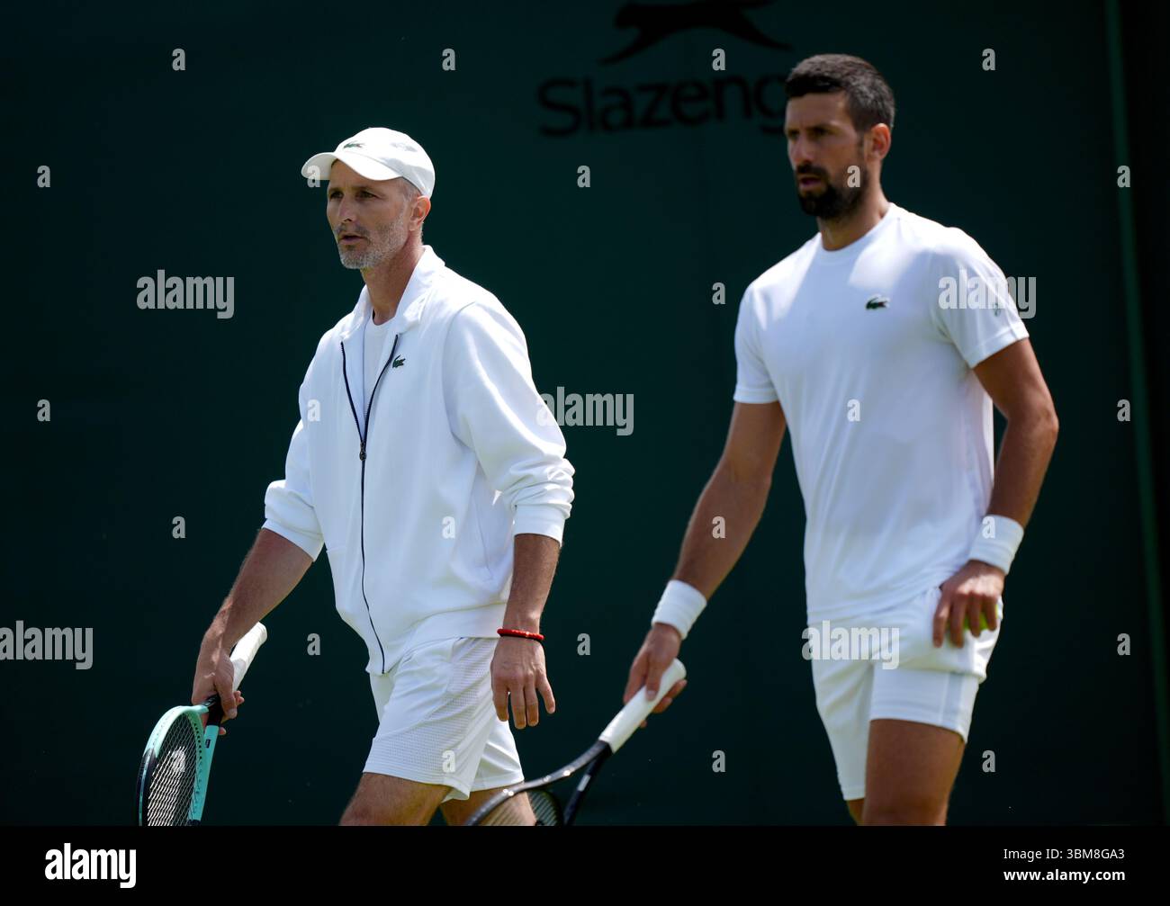 Novak Djokovic and coach Dusan Vemic during a practice session at the ...