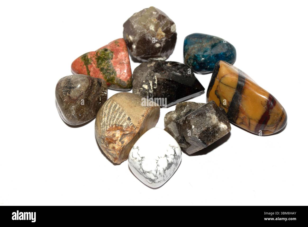 Collection of holistic healing crystal pieces and rocks spiritual on a ...