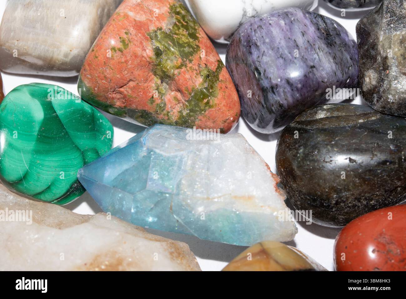 Collection of holistic healing crystal pieces and rocks spiritual on a ...