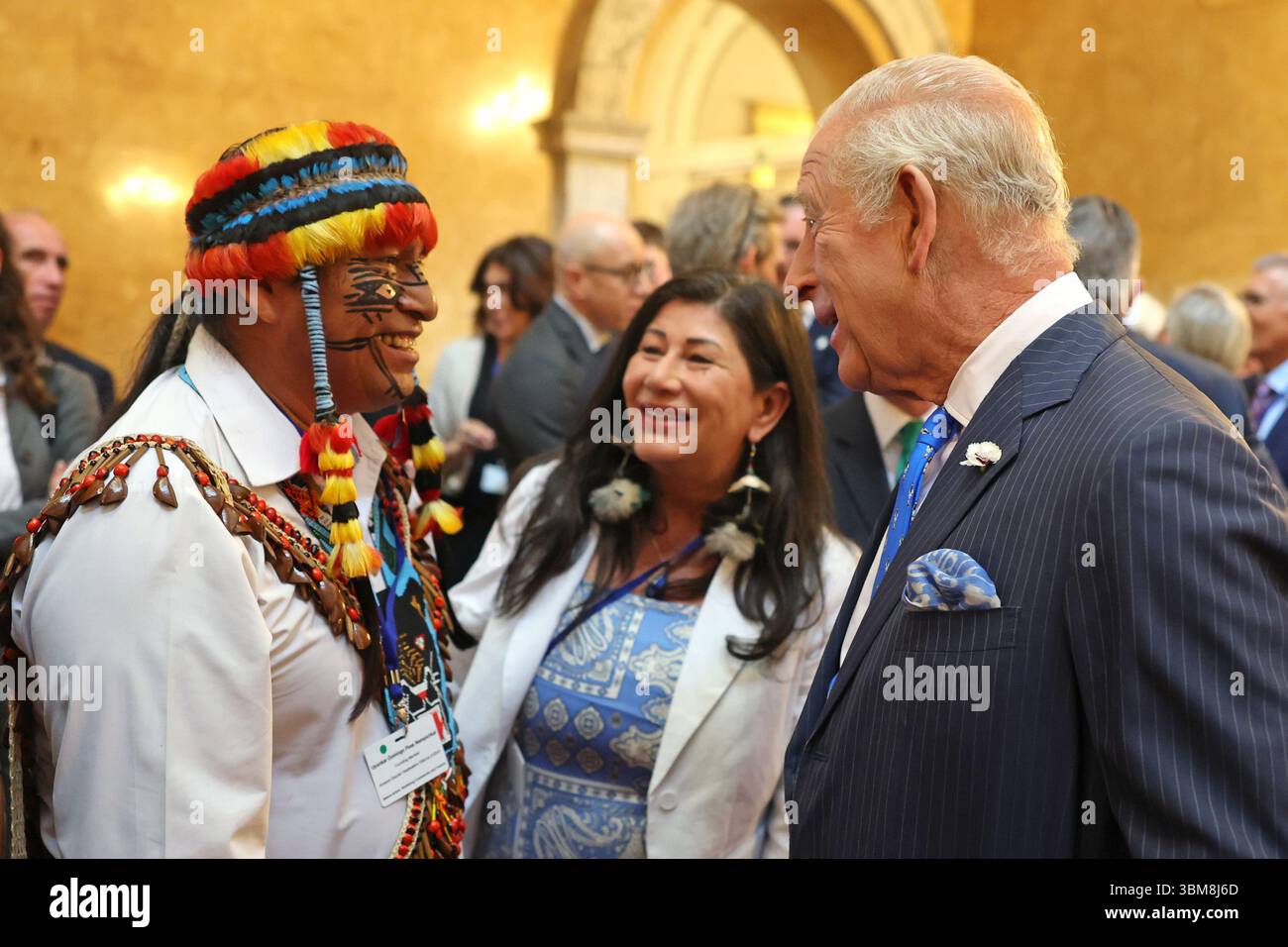 King Charles III speaks with the founding member of the Amazon Sacred ...