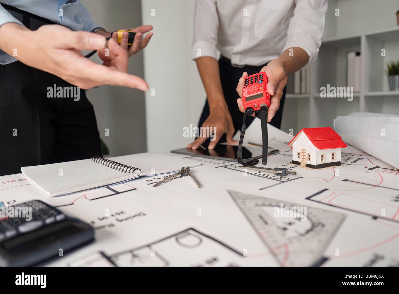 Measurement and Precision in Architecture. Professionals discussing ...