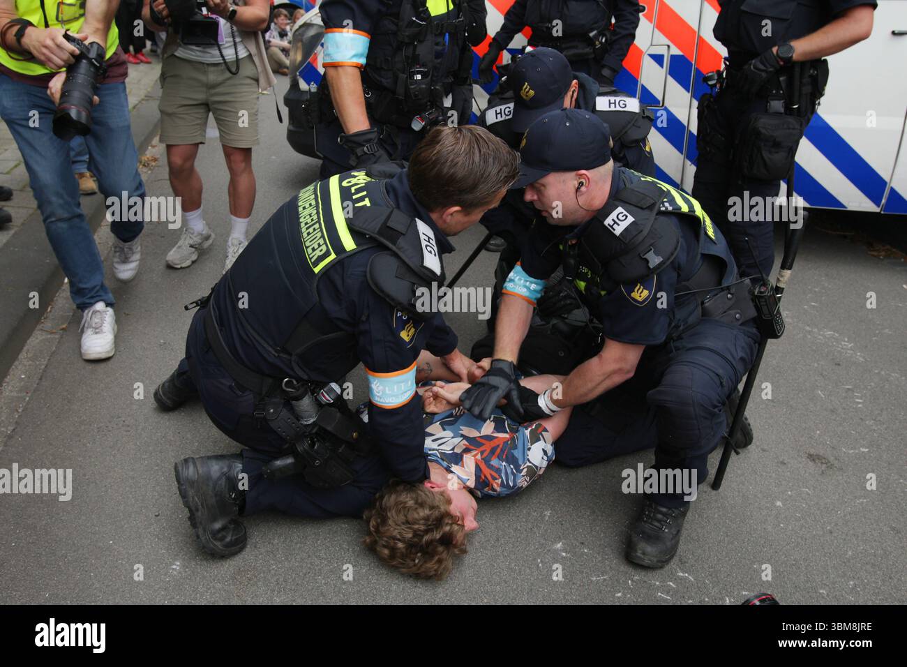 THE HAGUE,NETHERLANDS - JUNE 25: Dutch riot police detain the ...