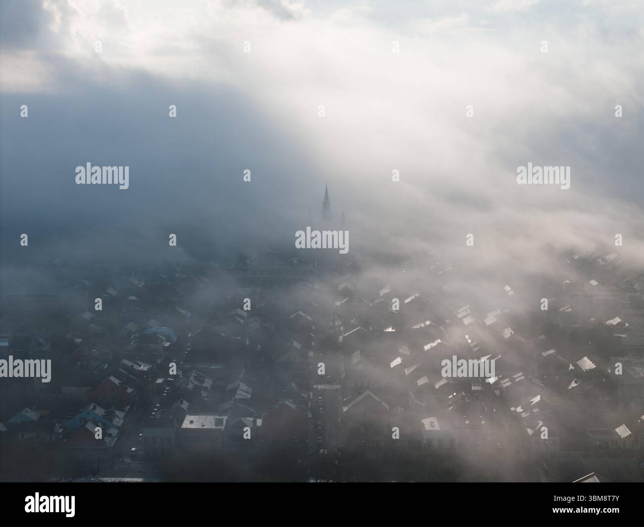 Aerial drone view of St. Louis Cathedral and Jackson Square shrouded in ...