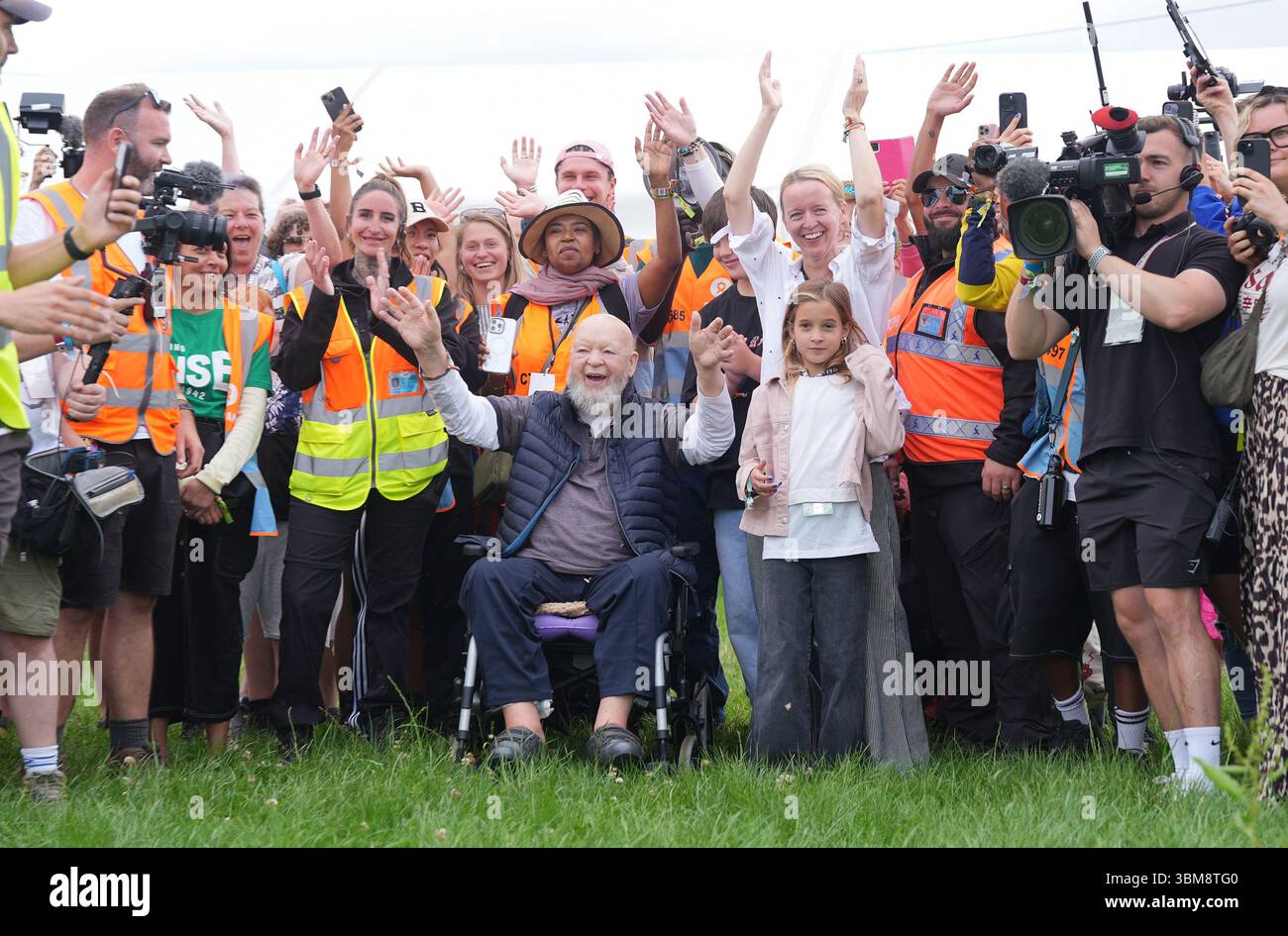 Organiser Emily Eavis and her father, co-founder Sir Michael Eavis ...