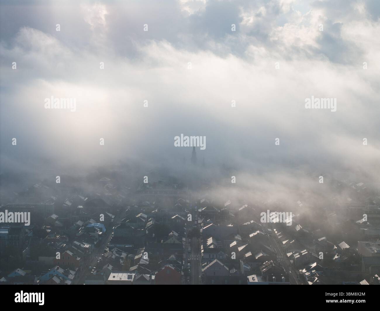 Aerial drone view of St. Louis Cathedral and Jackson Square shrouded in ...