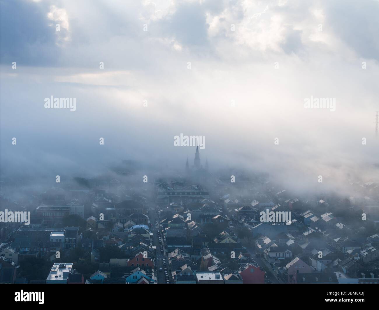 Aerial drone view of St. Louis Cathedral and Jackson Square shrouded in ...