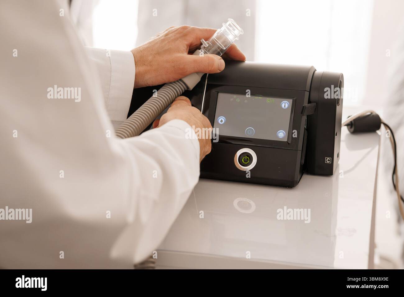 Cpap machine in hospital setting hi-res stock photography and images ...