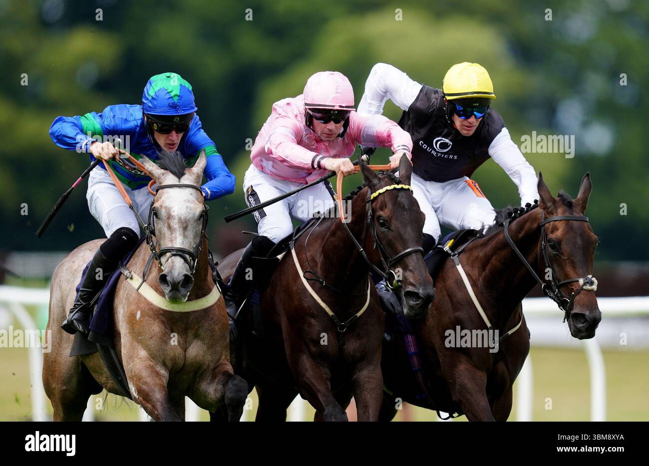 I'm a Believer ridden by Toby McCain-Mitchell (right) on their way to ...