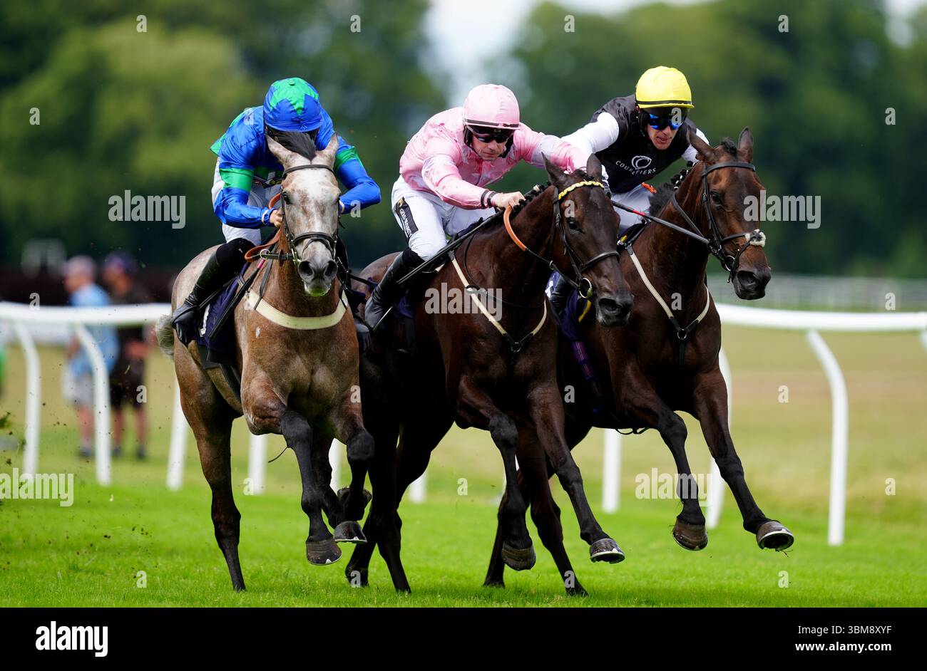 I'm a Believer ridden by Toby McCain-Mitchell (right) on their way to ...