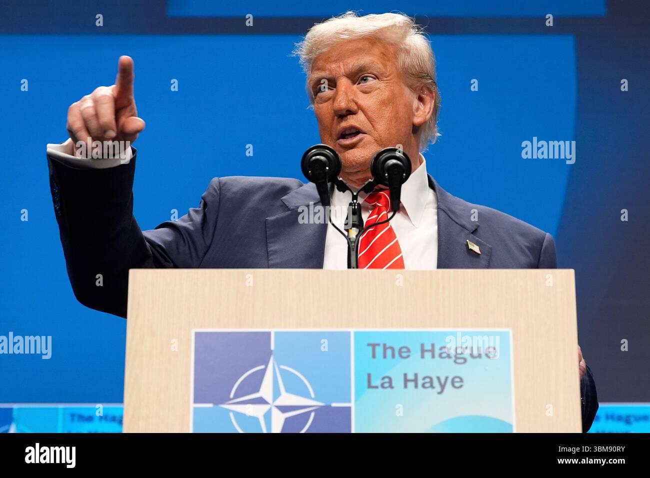 President Donald Trump points as he speaks during a media conference at ...
