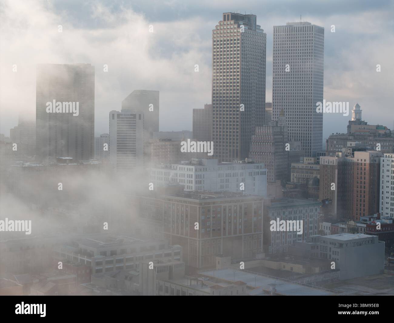 Aerial drone view of downtown New Orleans skyline shrouded in morning ...