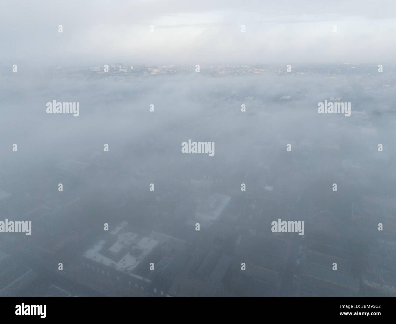 Aerial drone view of downtown New Orleans skyline shrouded in morning ...