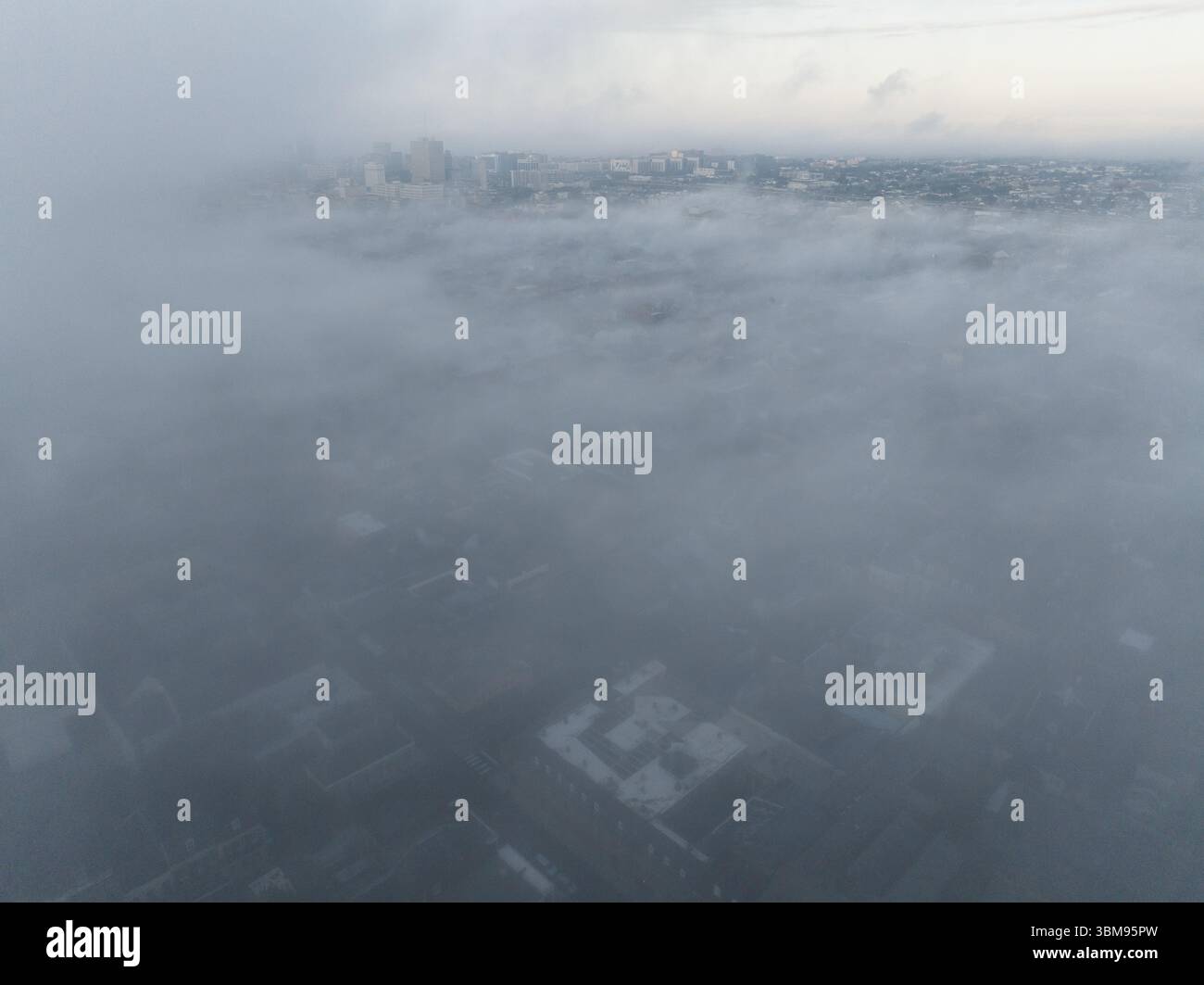 Aerial drone view of downtown New Orleans skyline shrouded in morning ...