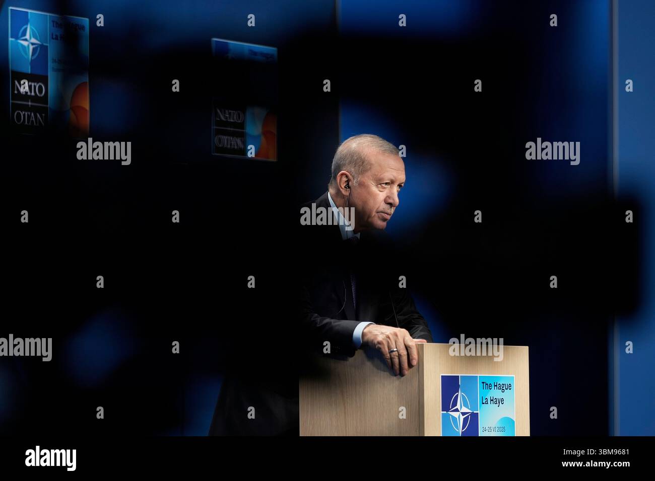 Turkish President Recep Tayyip Erdogan listens to questions during a ...