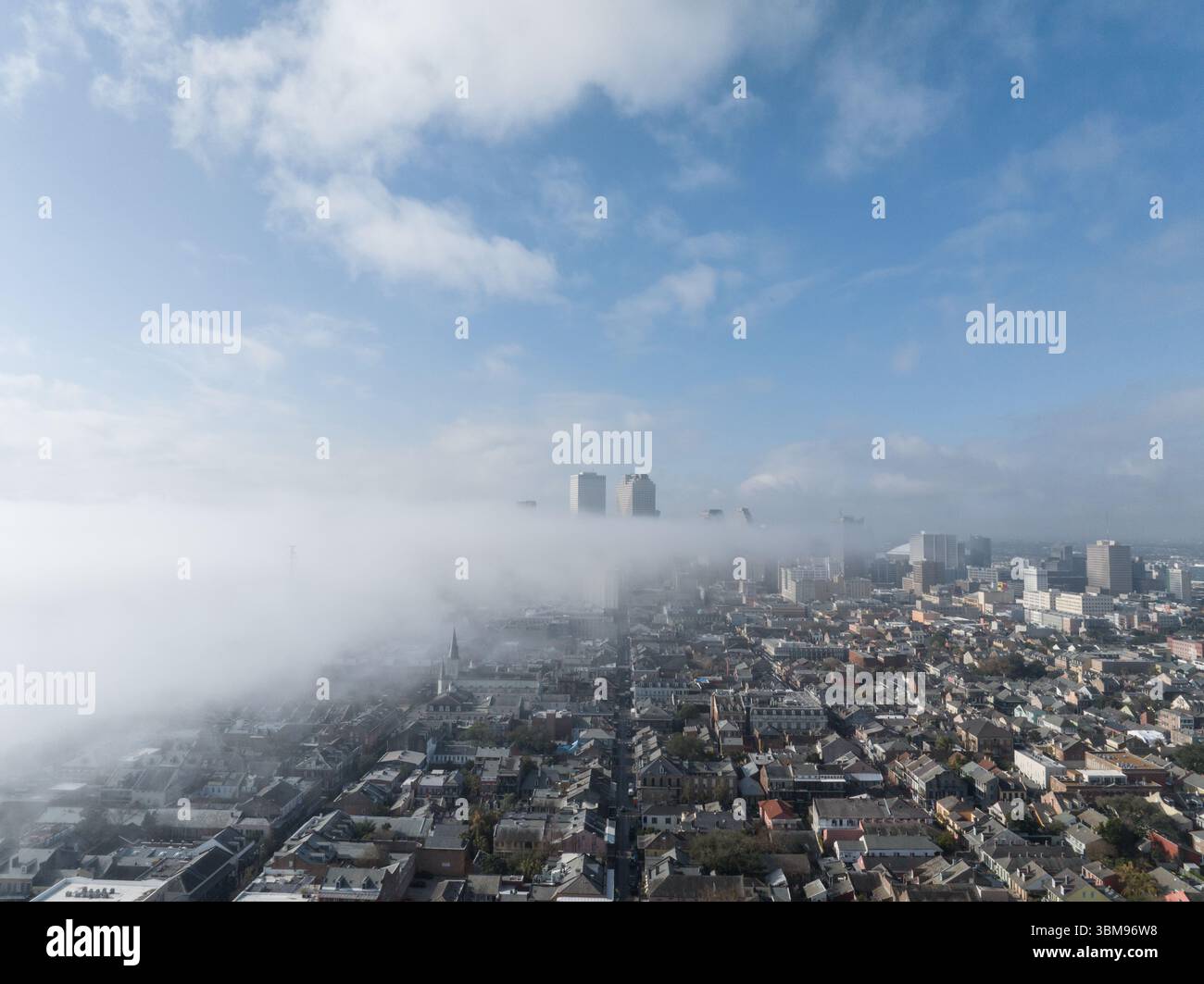Aerial drone view of downtown New Orleans skyline shrouded in morning ...