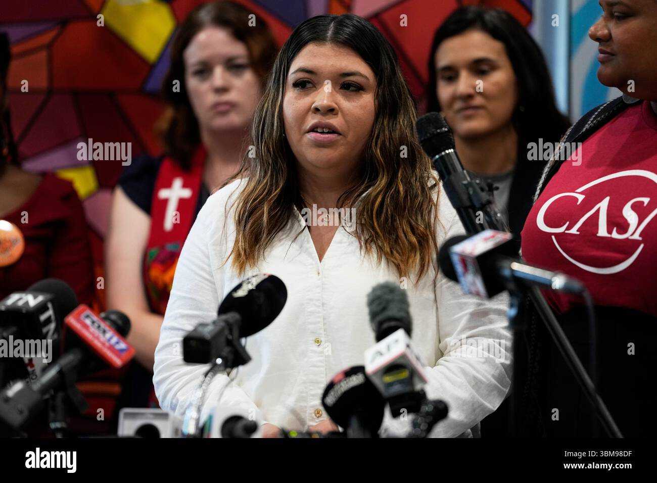 Jennifer Vasquez Sura, wife of Kilmar Abrego Garcia speaks during a ...