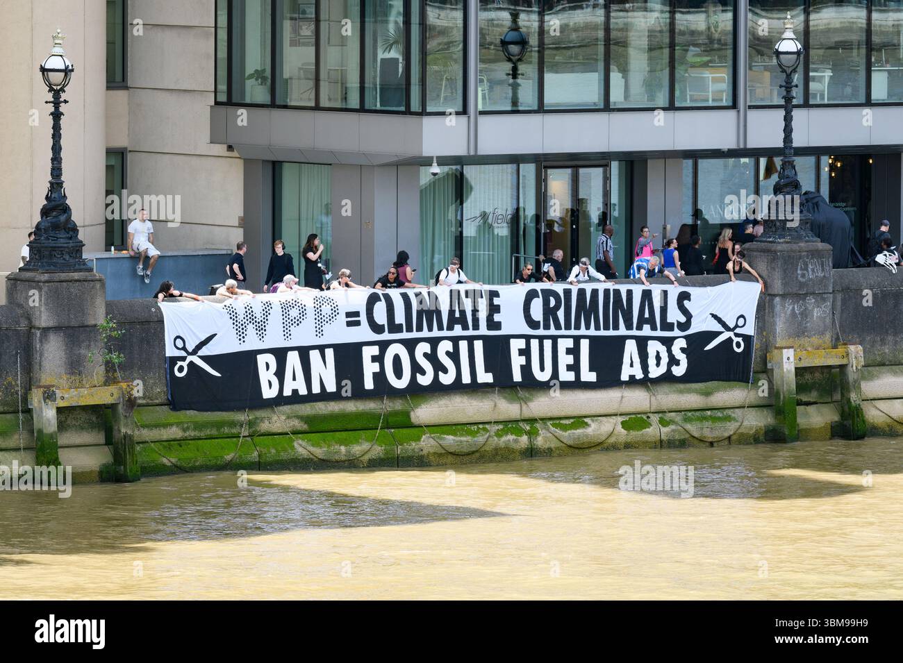 London, UK. 25 June, 2025. A large banner reading "WPP= Climate ...