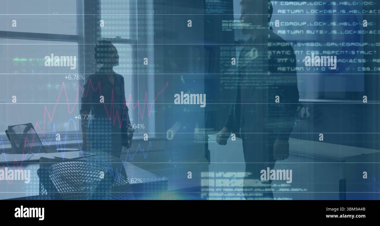 Two suited professionals reviewing digital data overlays at office ...