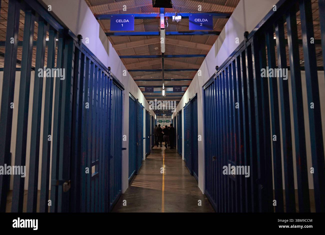 A hallway flanked by cells stands empty at the Los Lagos detention ...