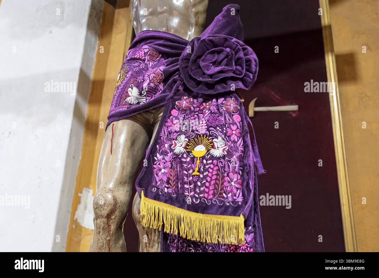 Church, Embroidered purple loin cloth on statue of Jesus for Lent ...