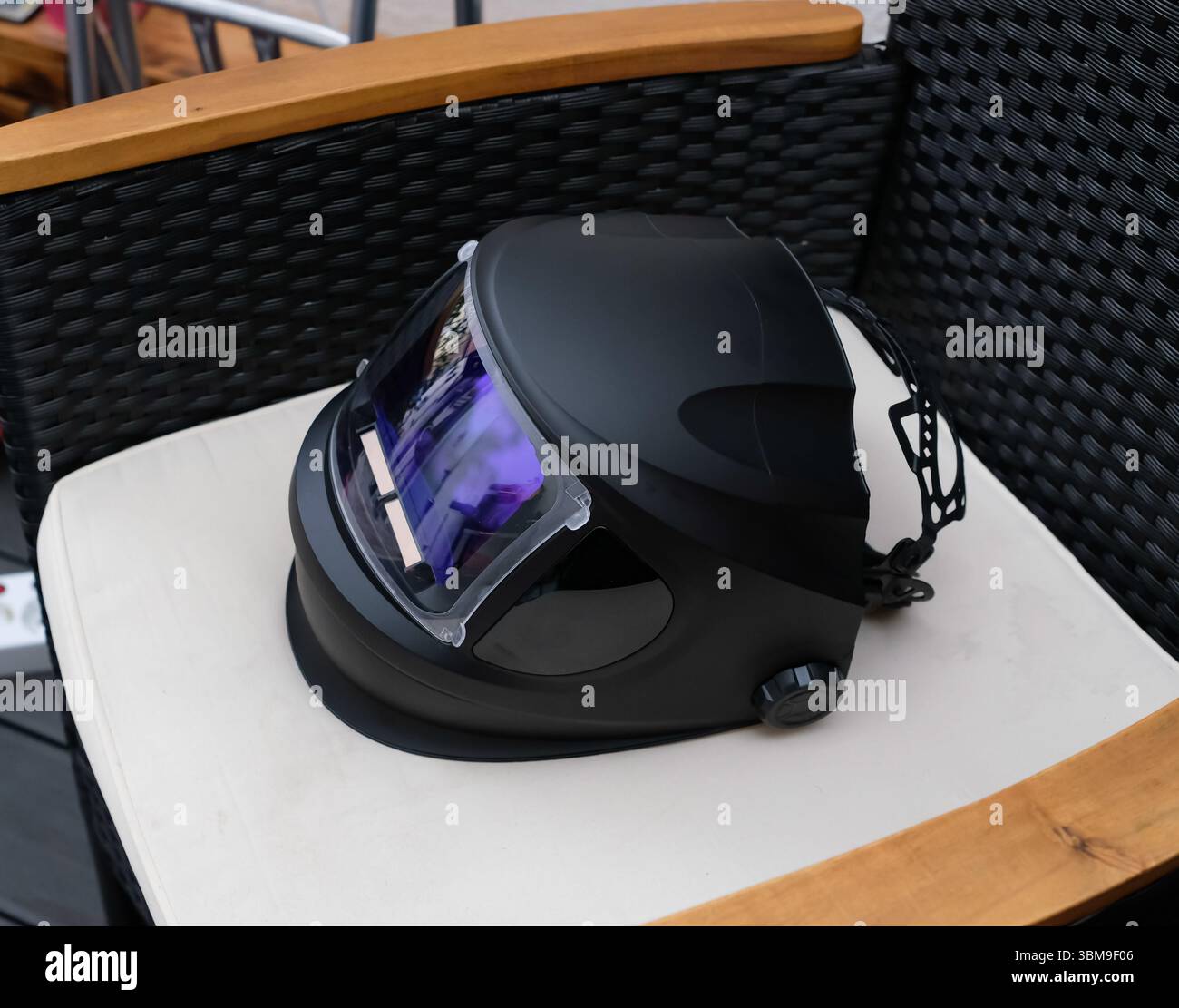 Welding Helmet with a Large Field of Vision in Home Interior. Welding ...