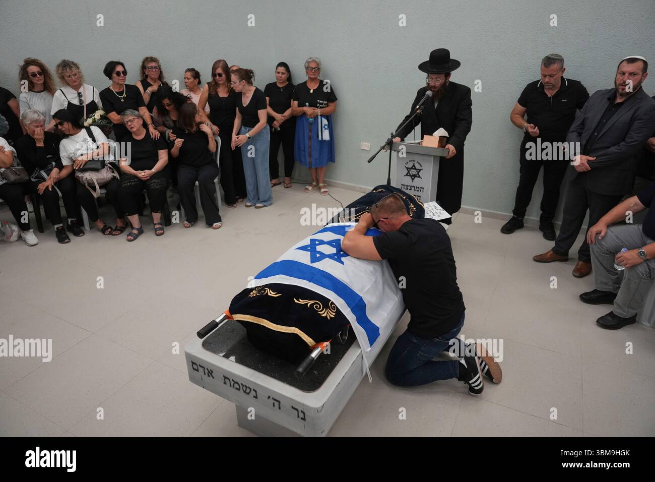 Nikolay Boguslavsky mourns over the body of his daughter, Noa ...