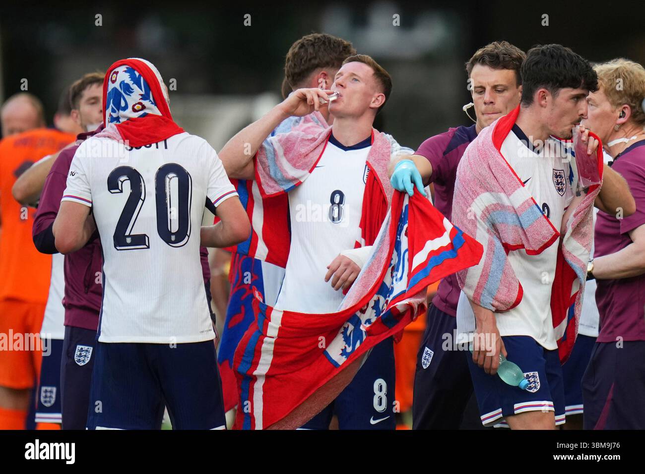 England players take a cooling break during the semi final soccer match ...