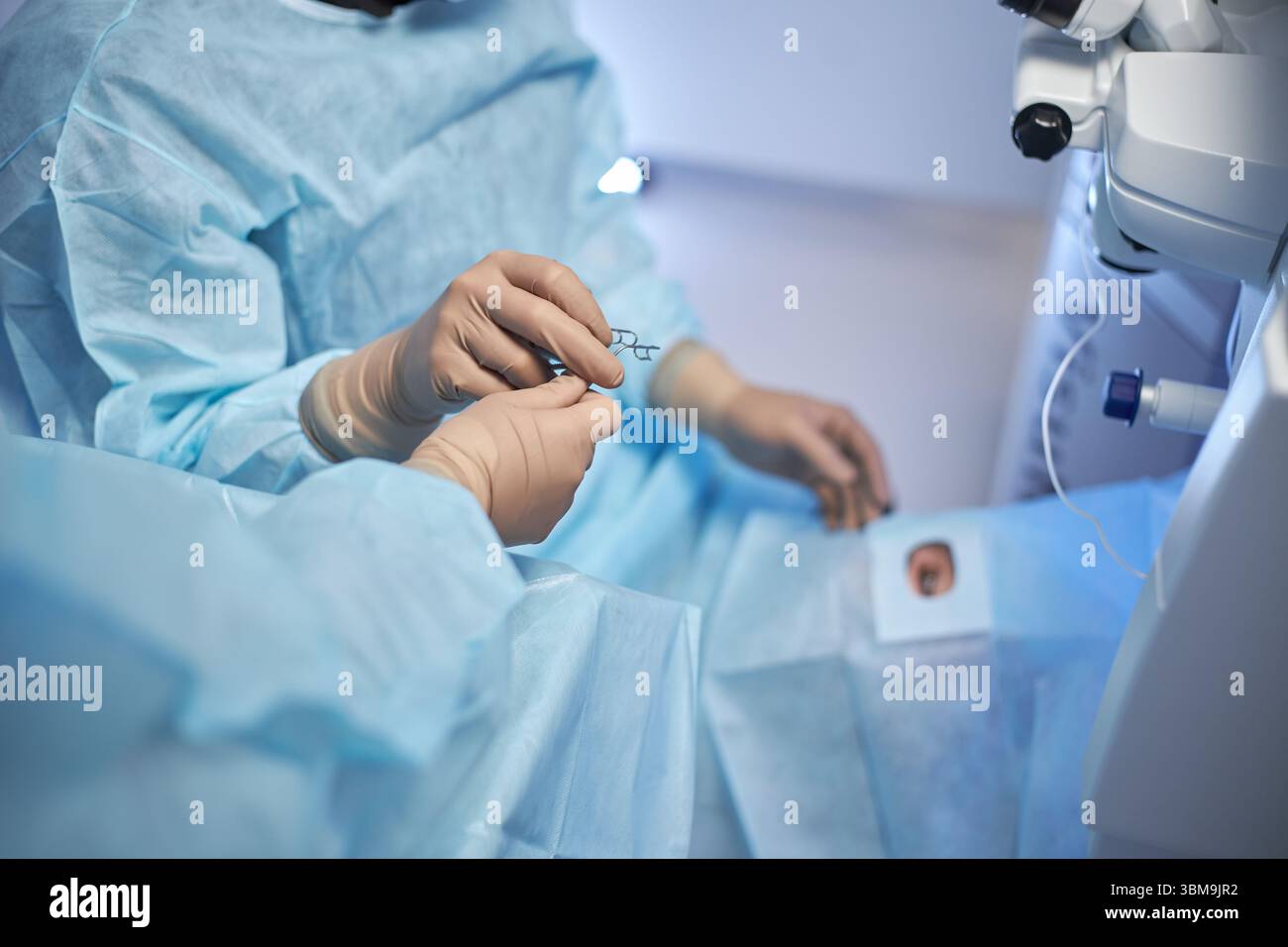 Surgeon Handing Surgical Instrument to Assistant in Operating Room ...