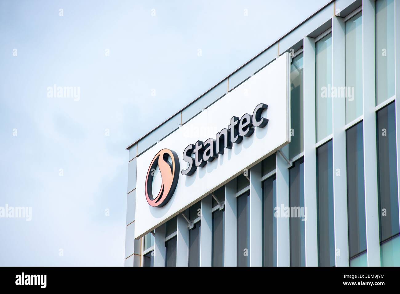 Detailed view of the Stantec logo on its office building. Stantec is a ...