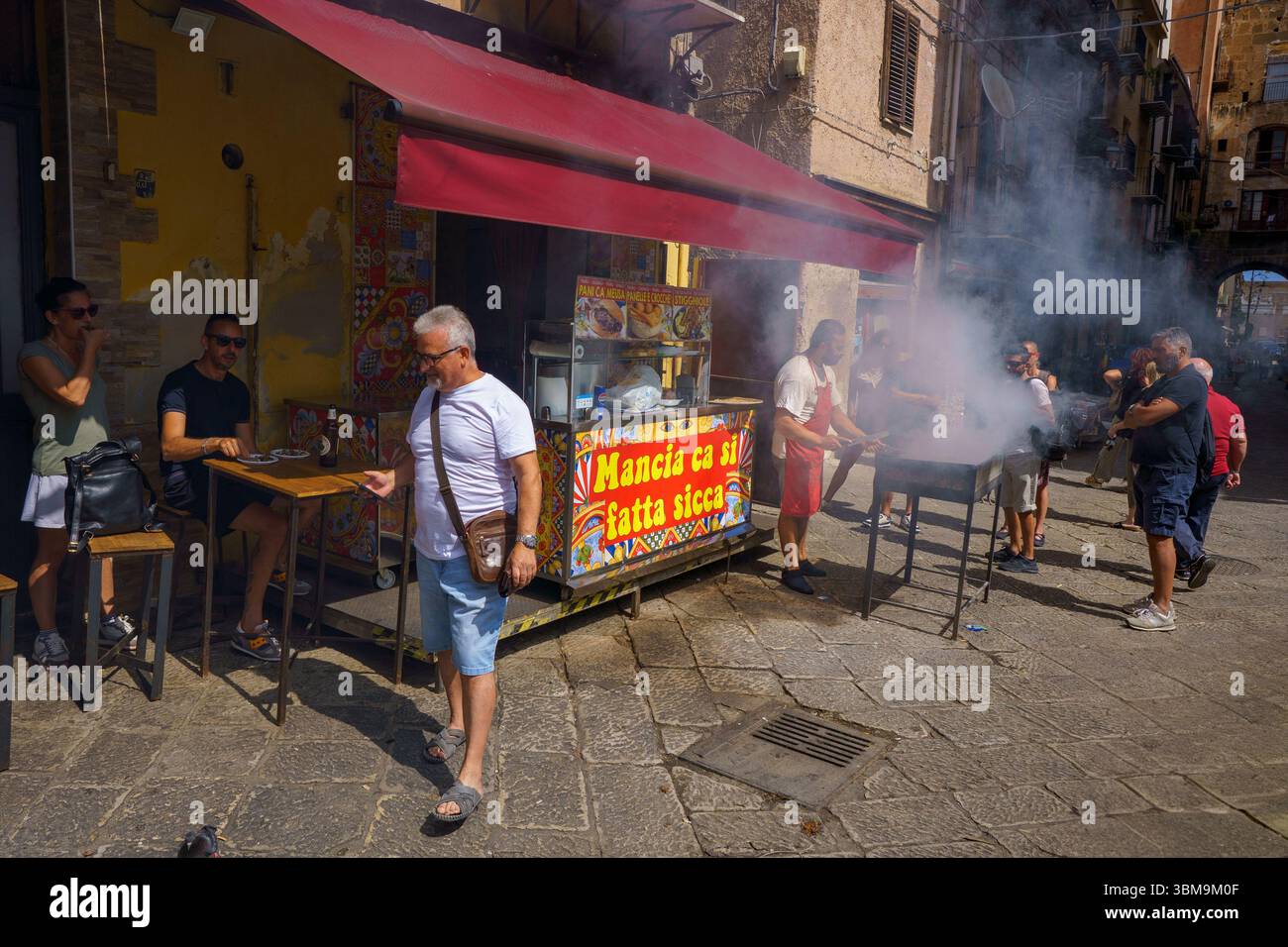 This image captures the vibrant energy of Ballarò Market in Palermo ...