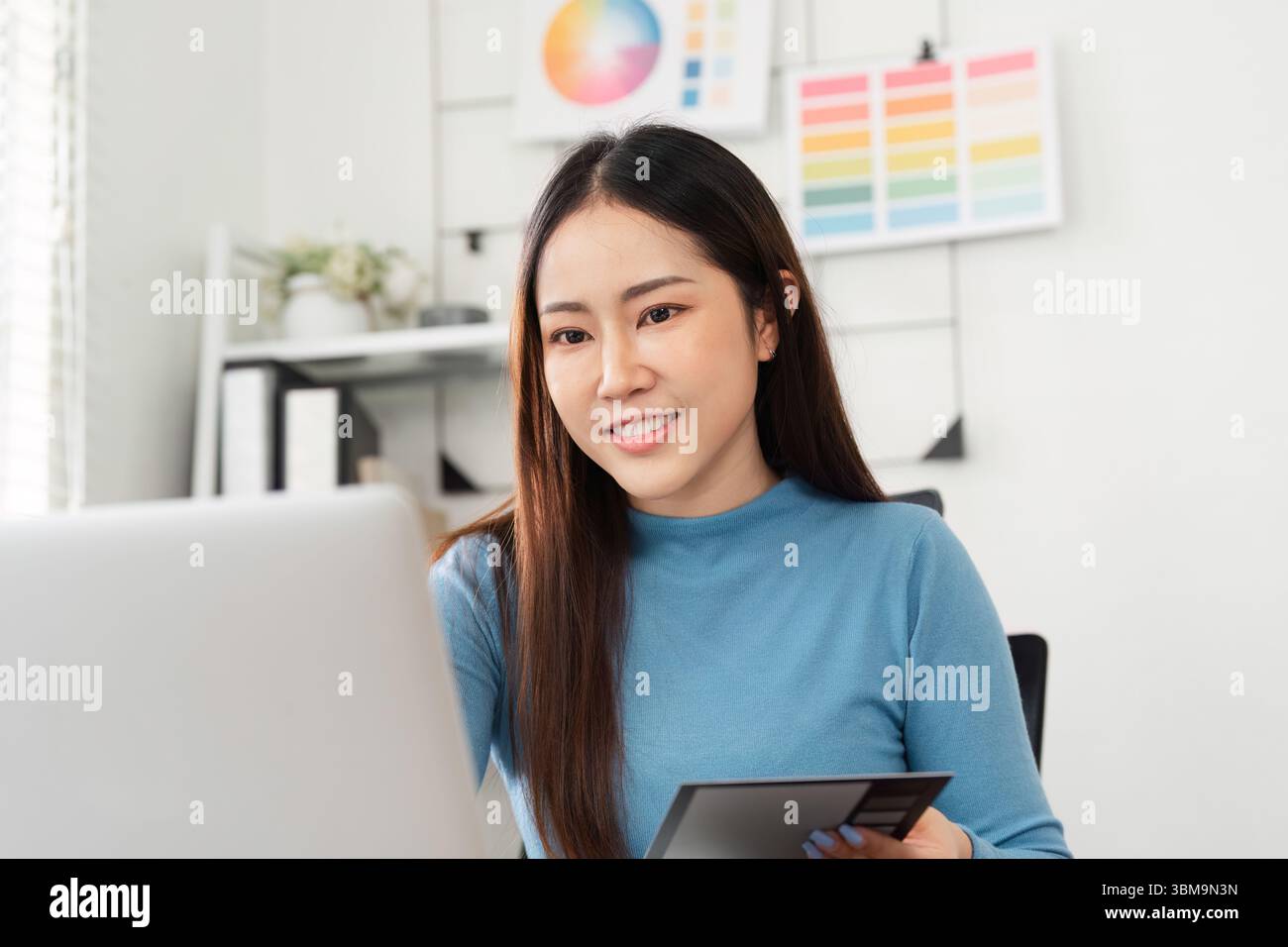 Engagement and Creativity. A young woman engaging in digital design ...
