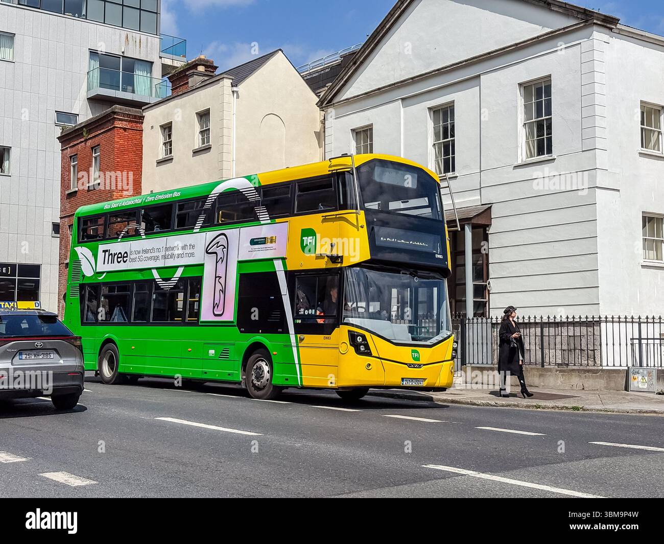 Dublin Bus, a yellow and green double-decker bus part of the TFI ...