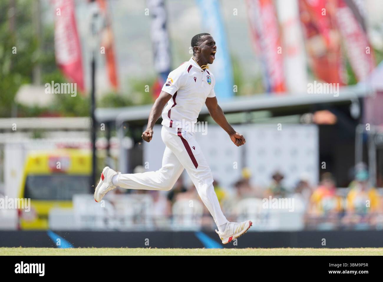 West Indies' Shamar Joseph celebrates taking the wicket of Australia's ...