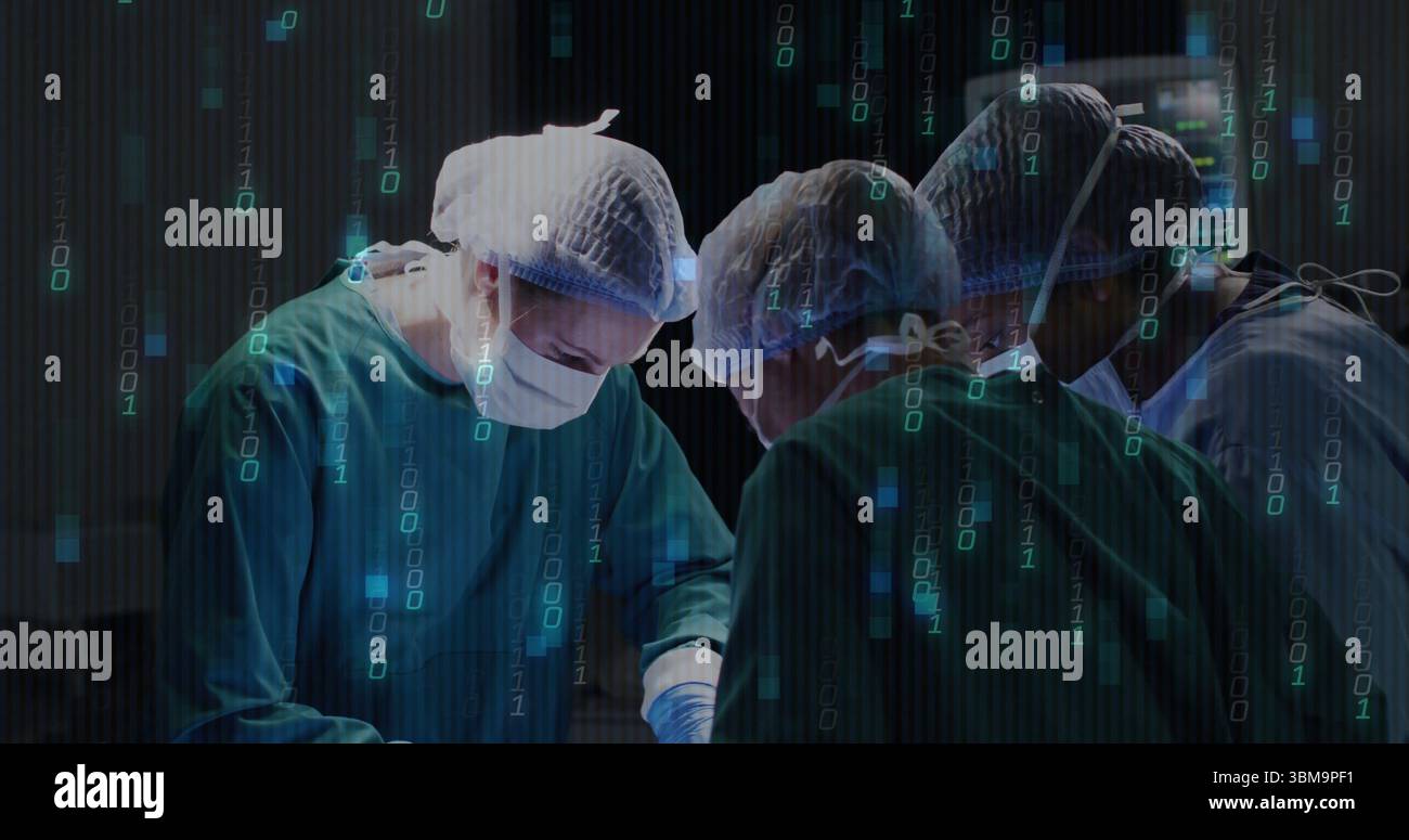 Operating surgical team in green gowns performing procedure in OR, with ...
