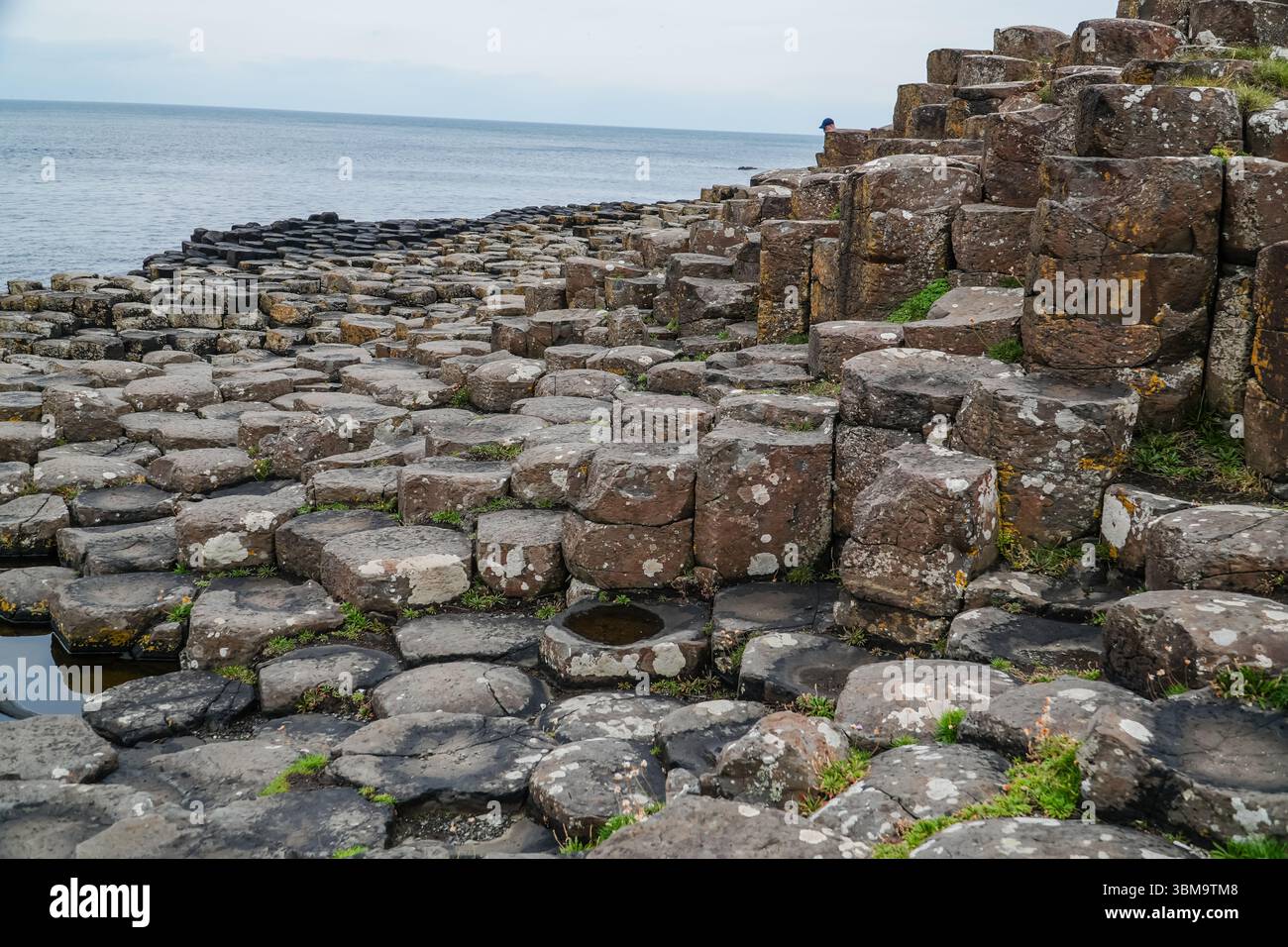 Giant's Causeway. Interlocking basalt columns formed by ancient ...