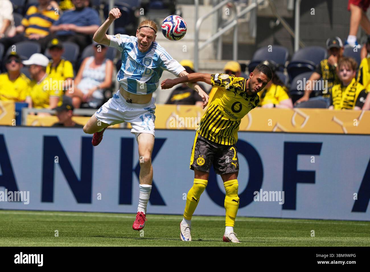 Ulsan HD's Gustav Ludwigson and Borussia Dortmund's Yan Couto go after ...