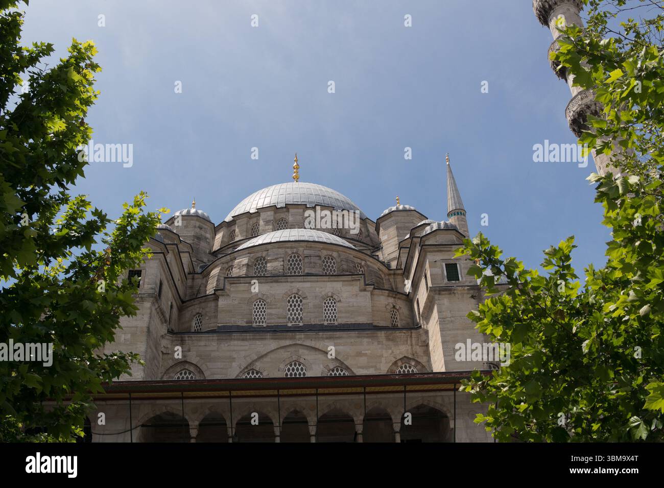 Visitors admire the stunning architecture of an Ottoman-era mosque ...