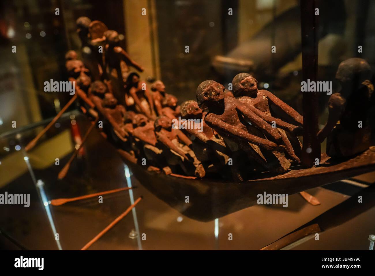 Painted wooden model of an ancient Egyptian Nile boat with figures ...