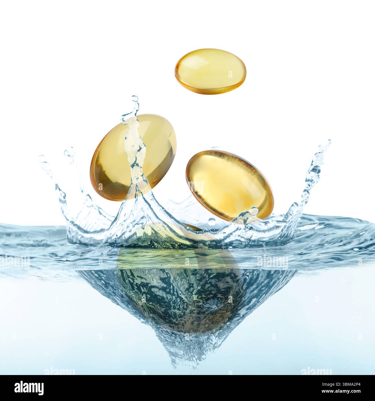 Collagen capsules falling into water on white background Stock Photo ...