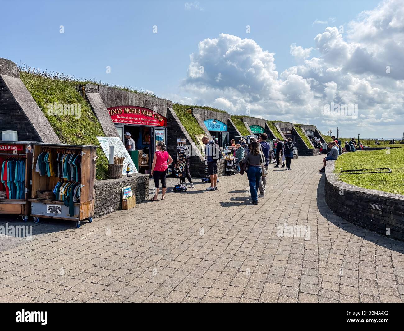 Cliffs of Moher Visitor Centre shops. Tourists browse goods at the ...