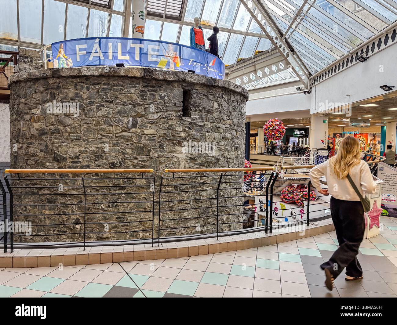 Eyre Square Centre in Galway features a section of the old city wall ...