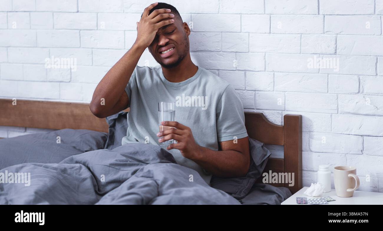 Sick man headache during fever hi-res stock photography and images - Alamy