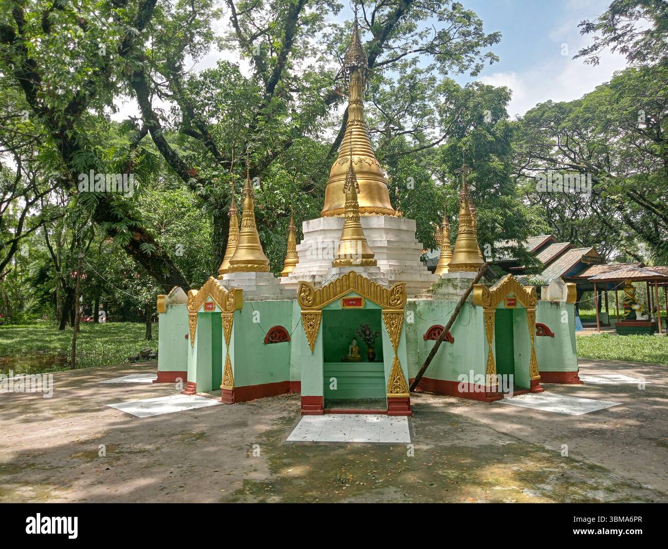 A Buddhist shrine in the jungle near Yangon in Myanmar Stock Photo - Alamy