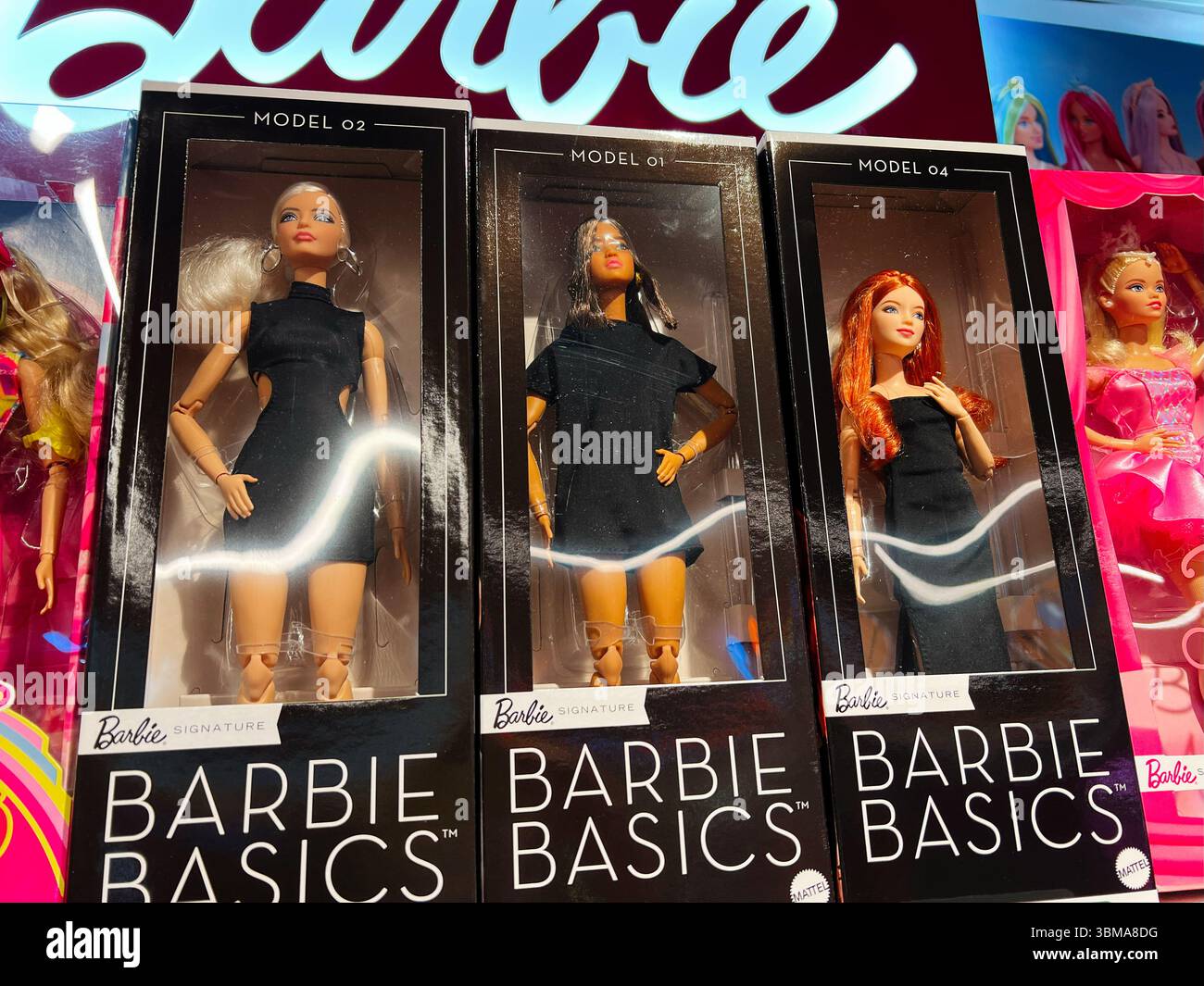 Kyiv, Ukraine - June 24, 2025: Three boxed Barbie Basics dolls in ...
