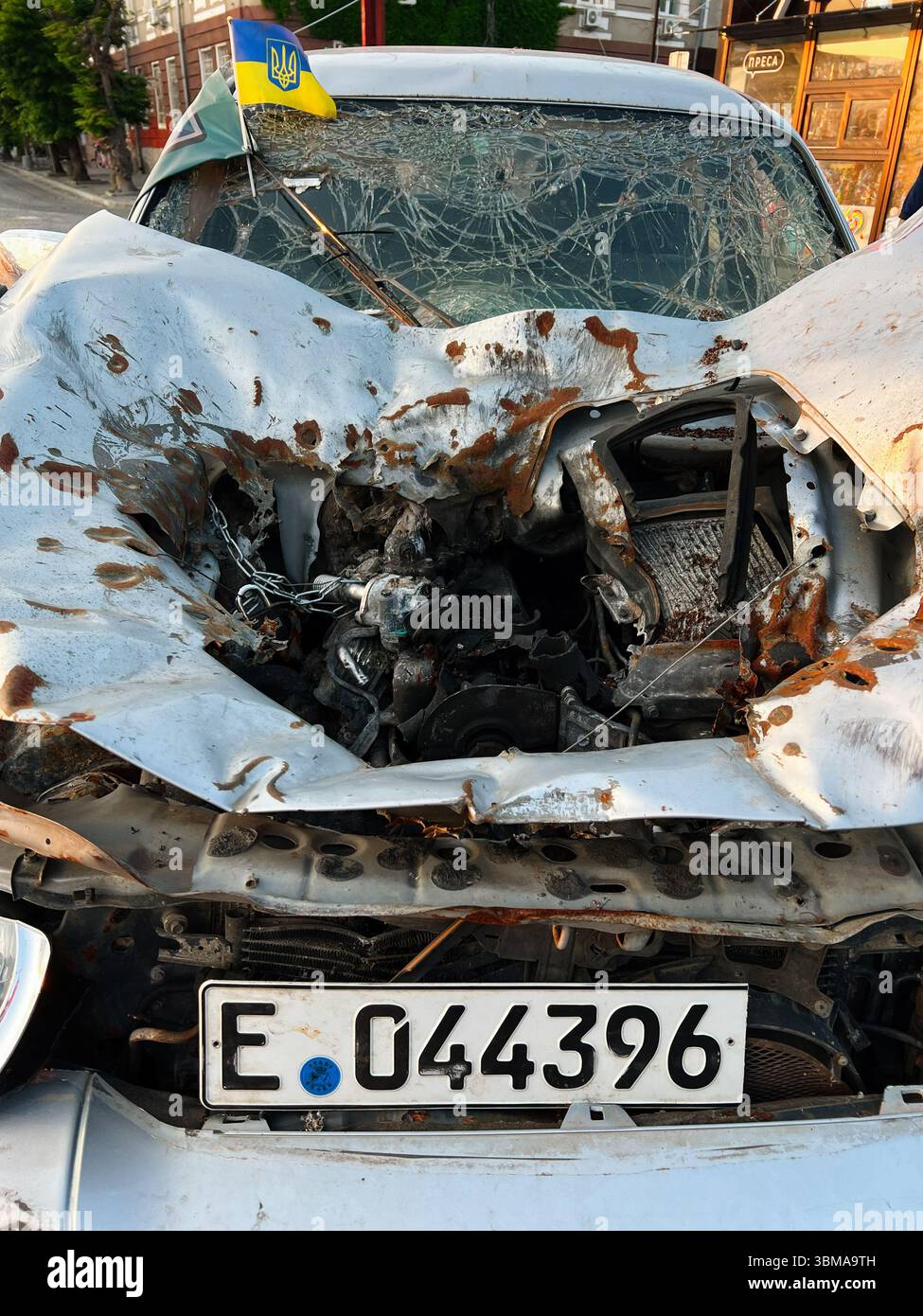 Ternpil, Ukraine - June 24, 2025: Heavily damaged car after drone with ...