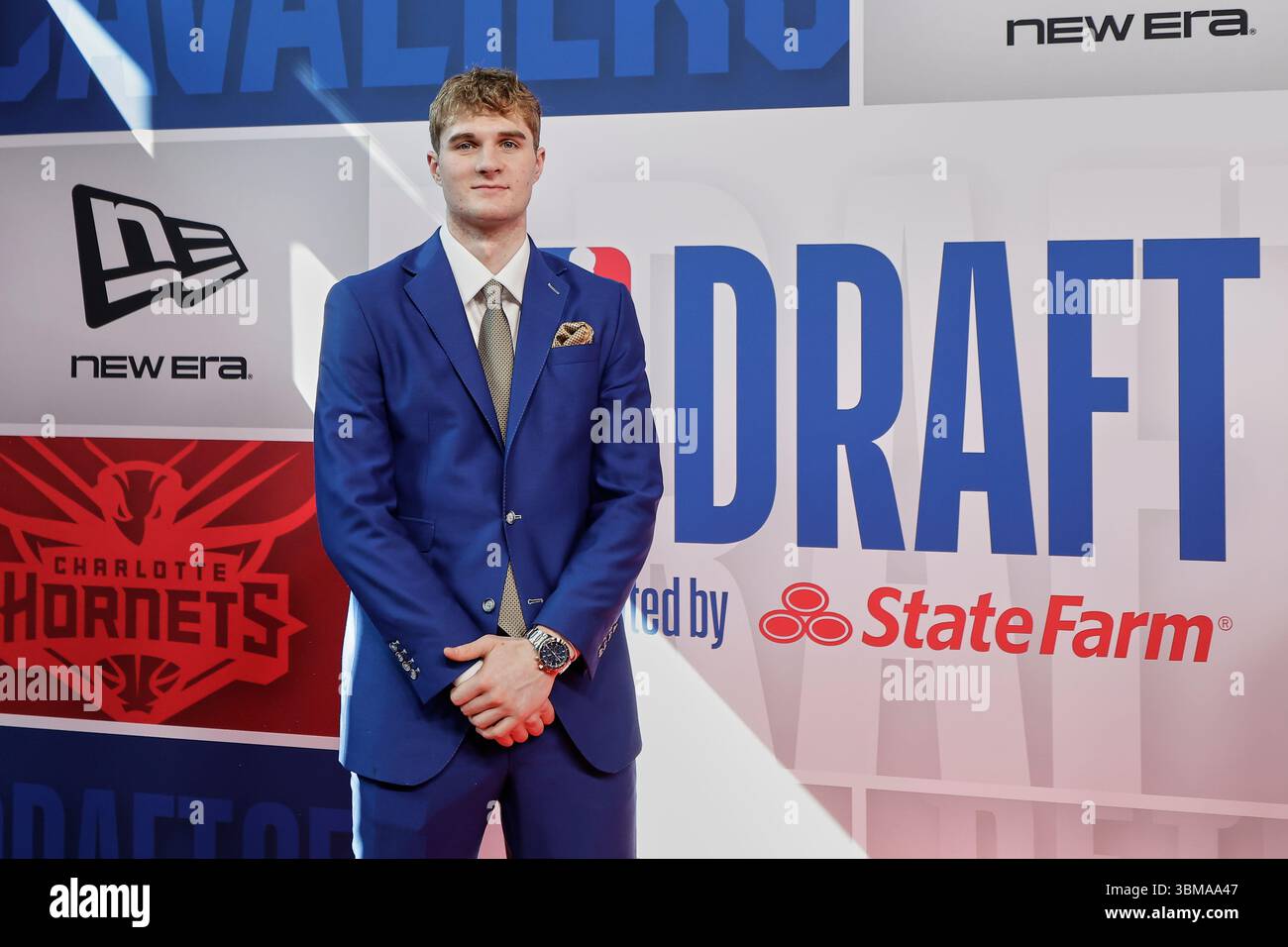 Liam McNeeley arrives for the first round of the NBA basketball draft ...