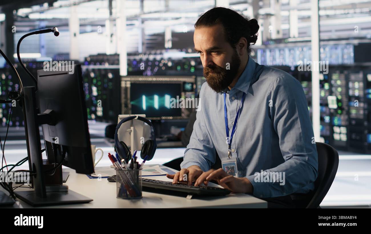 Angry data center engineer banging hi-res stock photography and images ...