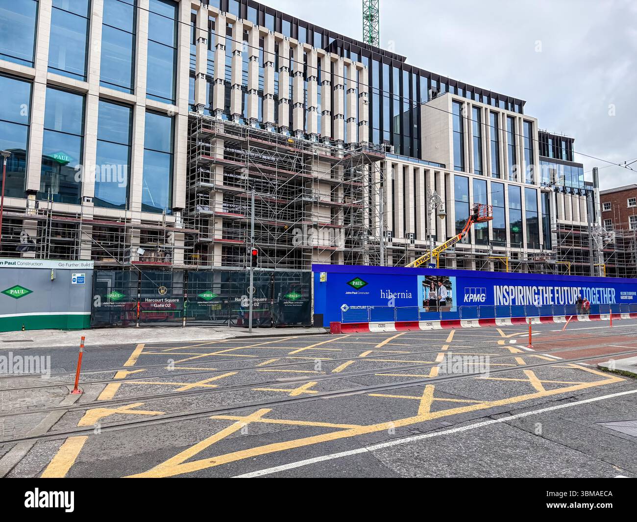 Modern building undergoing external construction and renovation with ...