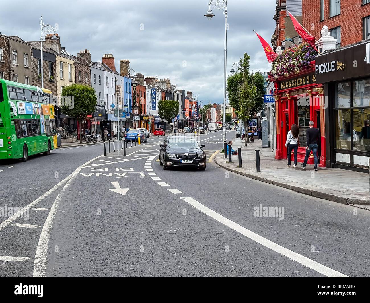 Lower Camden Street. Bustling street scene in Dublin with colorful ...