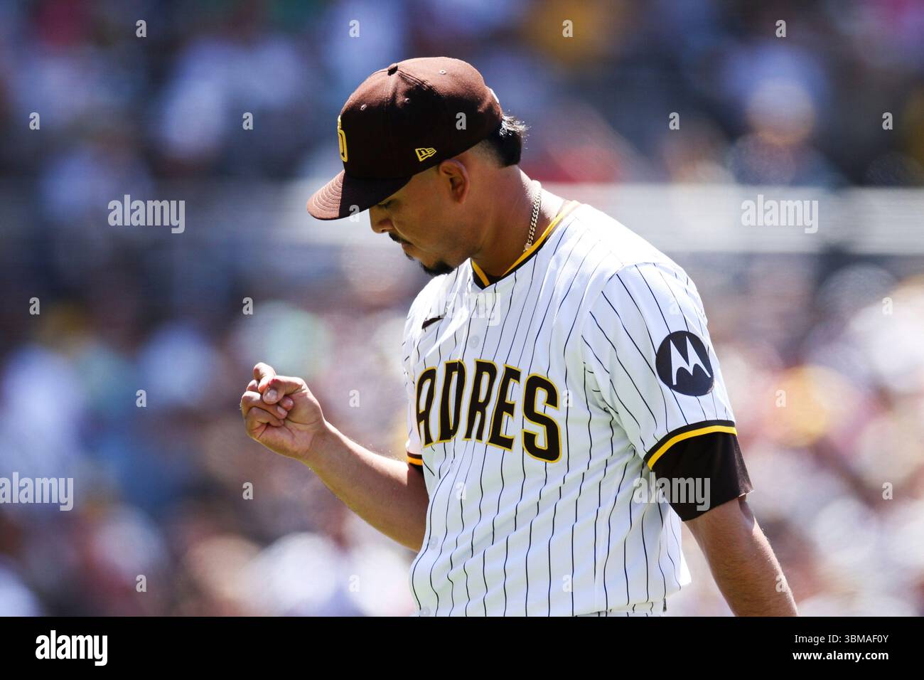 San Diego Padres' Jeremiah Estrada clinches his fist after striking out ...
